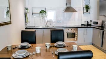 Apartamento Deluxe | Refeições no quarto