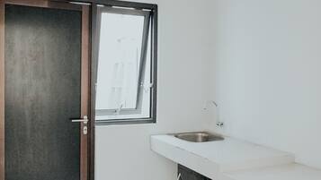 Quarto Deluxe | Espaço de cozinha partilhado