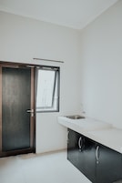 Quarto Deluxe | Espaço de cozinha partilhado