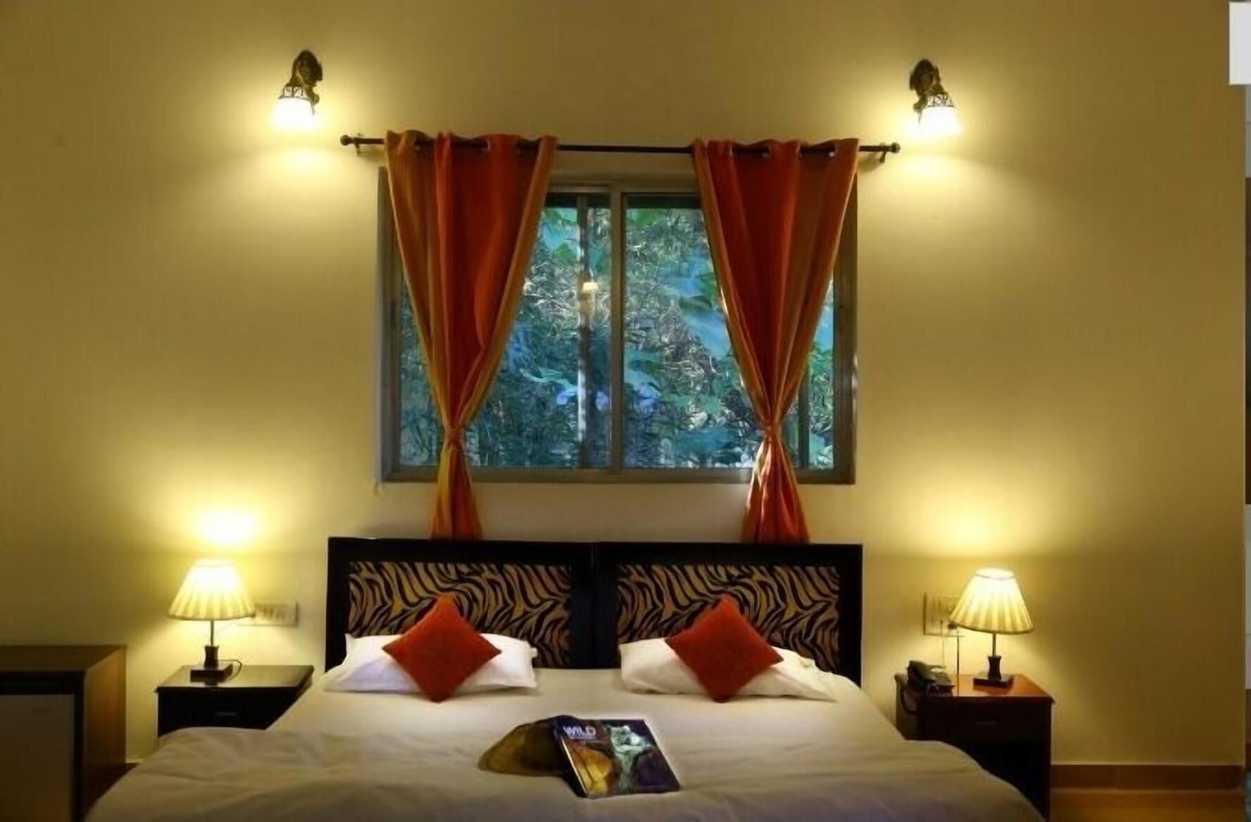 Roupas de cama premium, cortinas blackout, Wi-Fi de cortesia