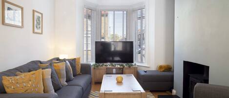 Casa conforto | Área de estar | TV de tela plana