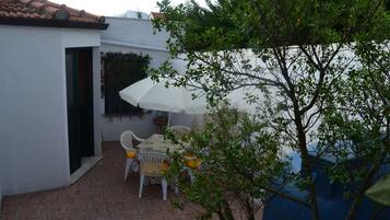 Casa, 2 quartos, fumadores, varanda | Varanda