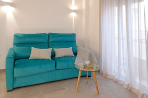 Apartamento, 2 quartos, terraço | Sala de estar