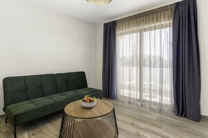Suite-Estúdio Júnior | Sala de estar | Smart TV de 43 polegadas com canais digitais, televisor 