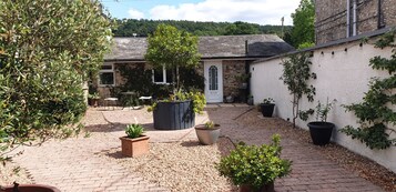 Quarto casal superior, suíte (Courtyard room) | Fachada