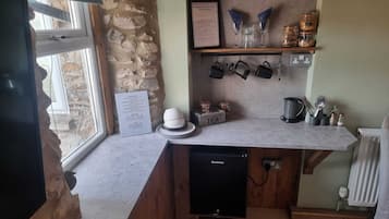 Quarto casal superior, suíte, vista para o pátio (Courtyard room) | Cozinha privada