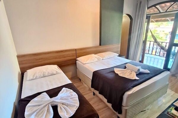 Quarto Triplo Superior | Minibar, Wi-fi grátis