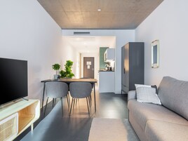 Suite XL with Sofa Bed | Sala de estar | Smart TV 