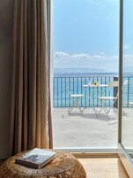 Suite Deluxe, vista para o mar | Cofre no quarto, quartos insonorizados, ferro/tábua de engomar 