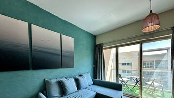 Apartamento Comfort | Sala de estar | TV de ecrã plano