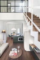 Apartamento luxo, 2 quartos | Área de estar