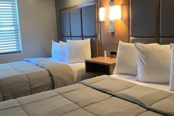 Apartamento Standard, 2 quartos, cozinha | Edredões de penas, camas de colchão Select Comfort