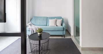 Quarto casal superior | Área de estar | Smart TV