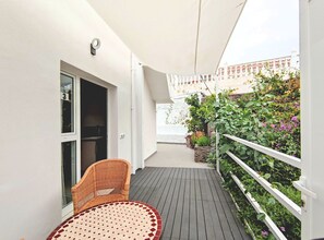 Estúdio, vários quartos, para fumantes, varanda | Terraço/pátio