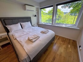 Apartamento premium | Vista para o jardim