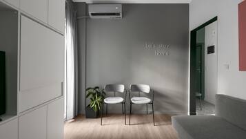 Apartamento Comfort | Sala de estar | Televisor