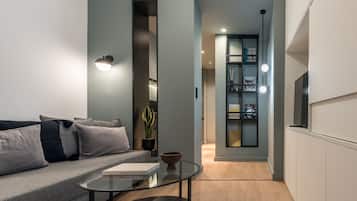 Apartamento Comfort | Sala de estar | Televisor