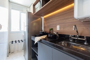 Suíte estúdio luxo | Cozinha privada | Geladeira, micro-ondas, máquina de café expresso