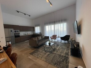 Apartamento | Sala de estar | TV de ecrã plano 