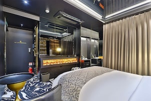 Roupa de alta qualidade, edredões de penas, minibar 