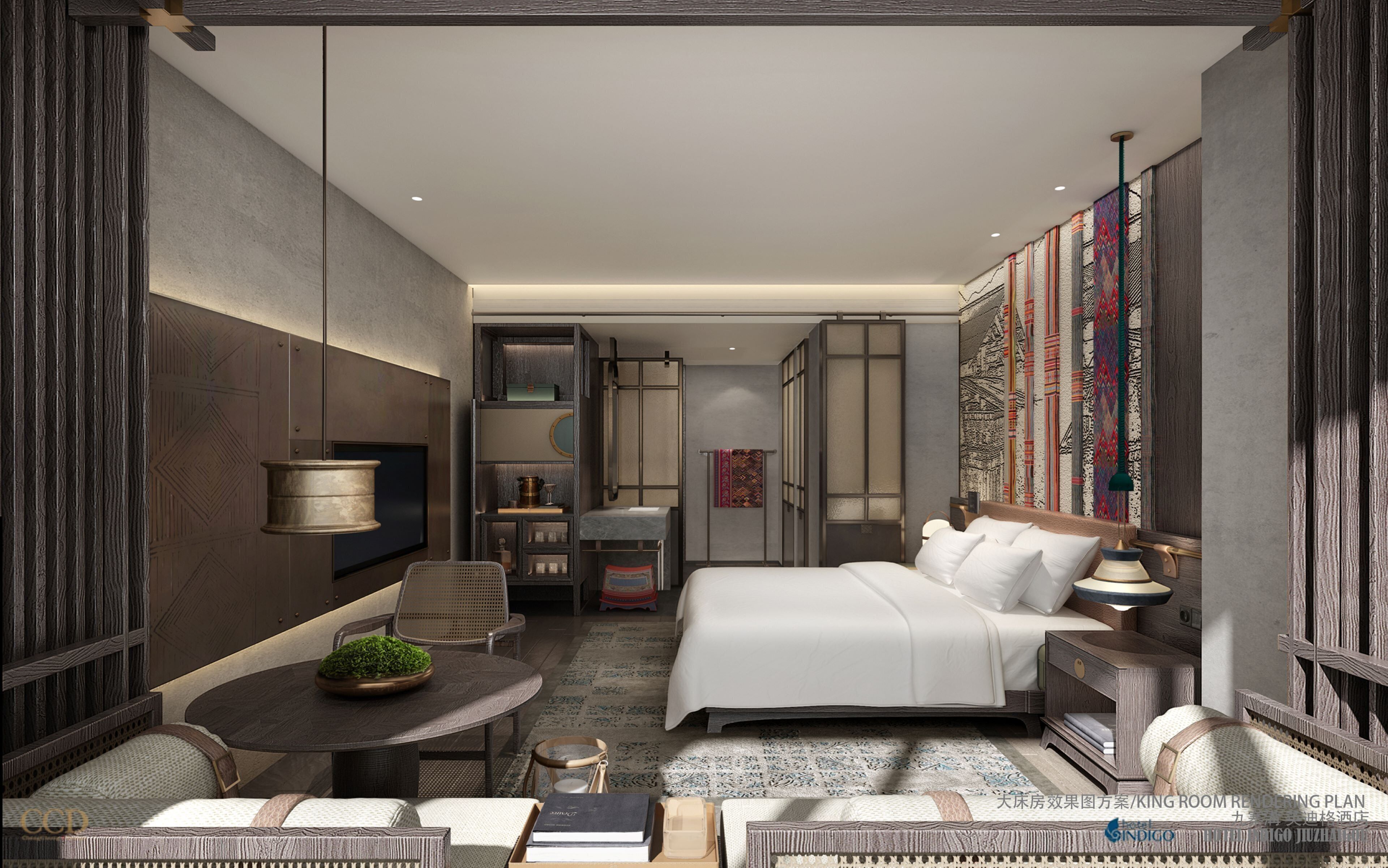 Quarto de hotel moderno com uma cama grande, um espaço de estar com mesa redonda e vista para a cidade.