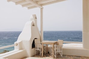 Quarto luxo, vista para o mar | Terraço/pátio