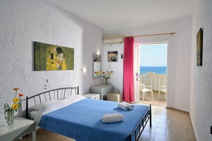 Apartamento família, 1 quarto, vista para o mar | Opções para refeição no quarto