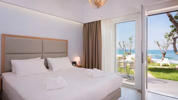 Deluxe Bungalow, Beachfront | Camas com colchões pillow-top, cofres nos quartos, cortinas blackout