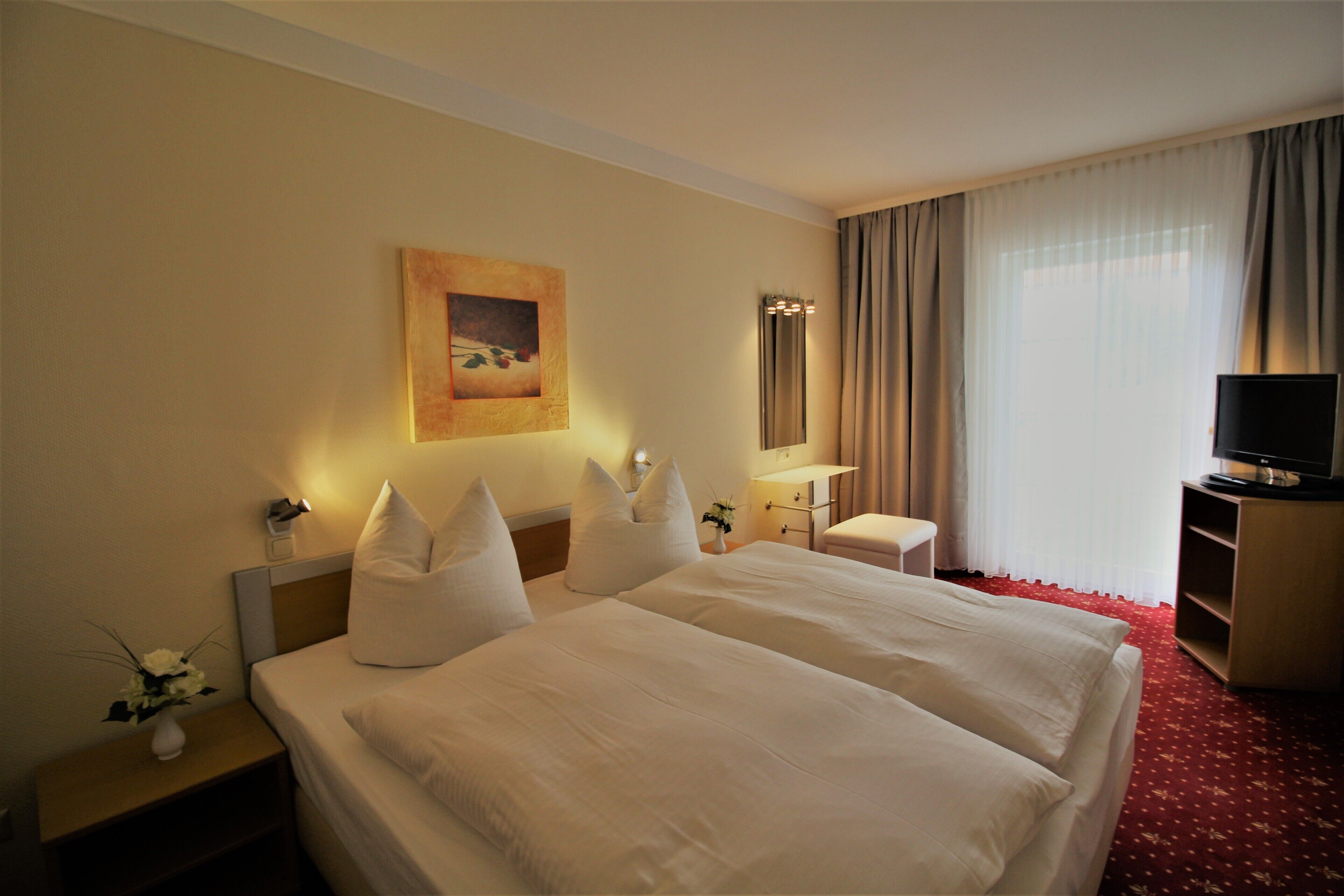 Apartamento (Parkchalet) | Frigobar, escrivaninha, Wi-Fi de cortesia, roupa de cama