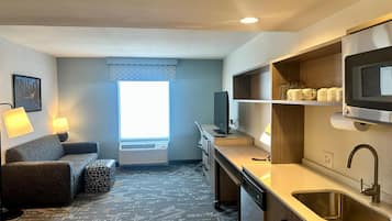 Suite, 1 cama king-size | Sala de estar | Televisor LCD, base para leitor de MP3