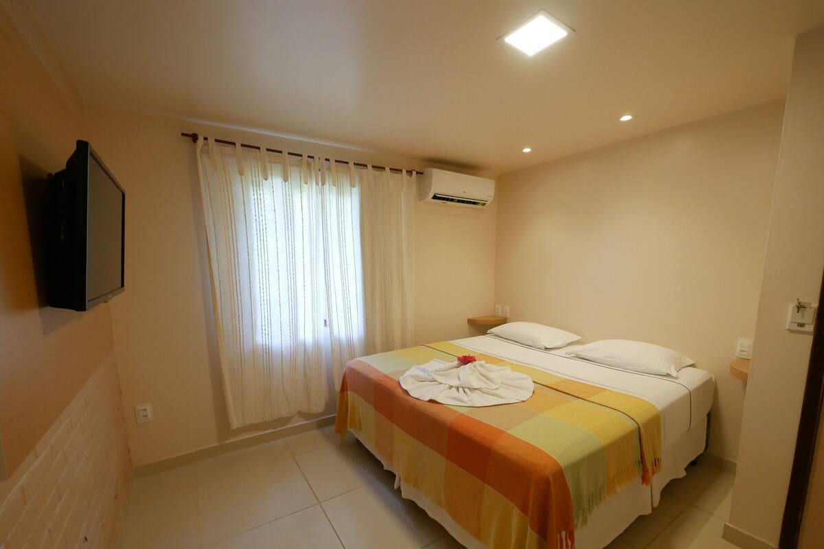 Quarto duplo standard | Frigobar, cofres nos quartos, cortinas blackout, Wi-Fi de cortesia