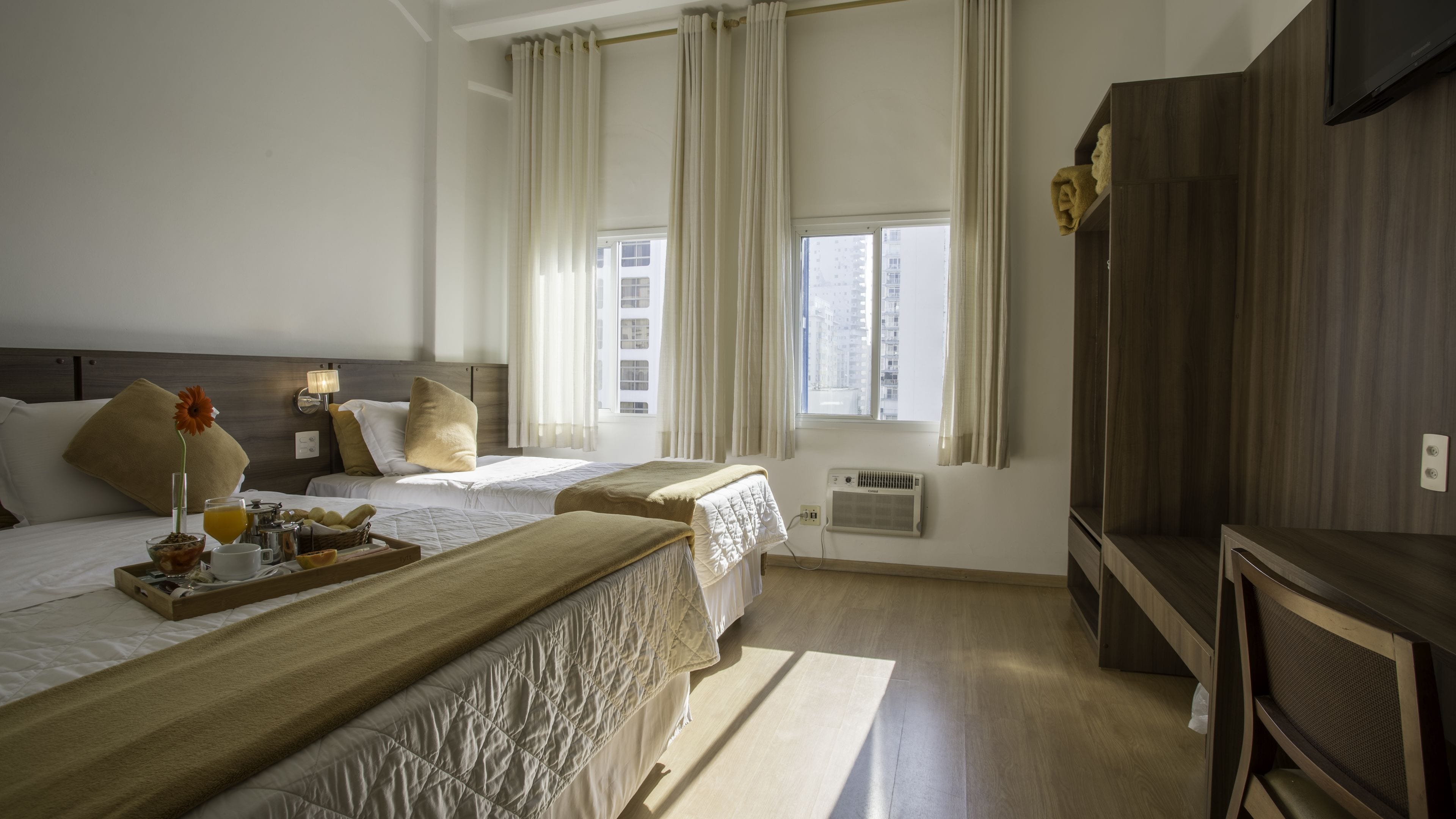 Suite de Luxo, vista para a praia | Minibar, secretária, Wi-fi grátis, roupa de cama fornecida 