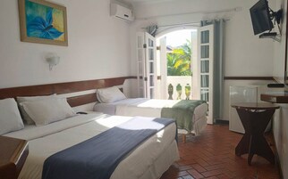 Suites Varanda | Minibar, cofre com capacidade para portátil, cortinas/cortinados opacos 