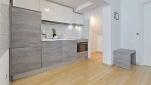 Apartamento conforto, 1 quarto, terraço | Cozinha privada