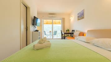 Estúdio, varanda, vista para o mar | Secretária, Wi-fi grátis, roupa de cama fornecida