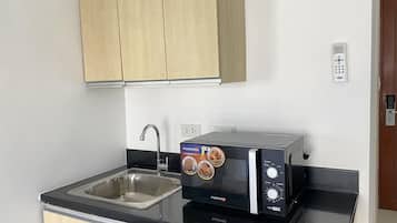Suite Executiva | Cozinha privada | Um frigorífico, uma cafeteira/bule