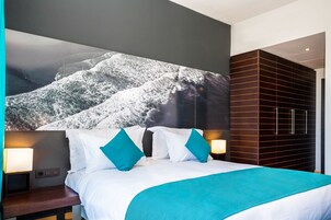 Quarto solteiro standard, 1 quarto | 1 quarto, roupas de cama premium, frigobar, cofres nos quartos