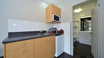 Suíte estúdio luxo, 1 cama Queen | 1 quarto, cofres nos quartos, escrivaninha
