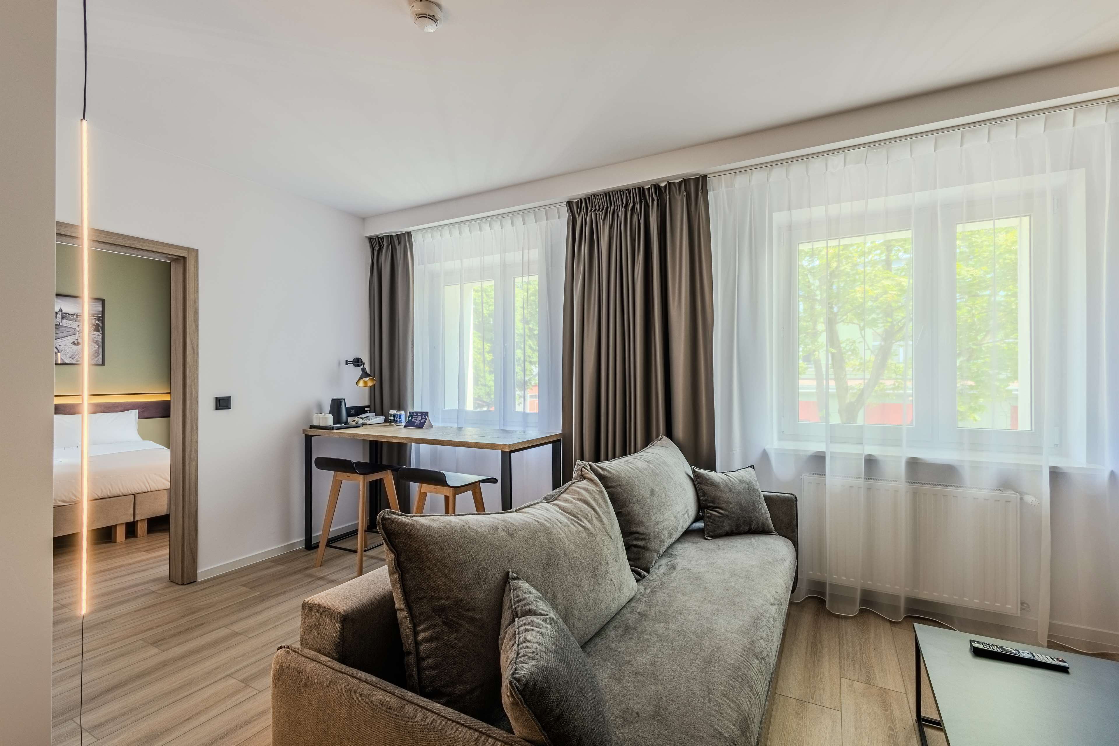 Suíte, 1 cama King | Escrivaninha, cortinas blackout, quartos à prova de som