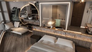 Quarto de hotel moderno com cama, área de estar, penteadeira e um espelho grande.