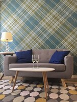 Apartamento, 1 quarto | Sala de estar | Televisor 