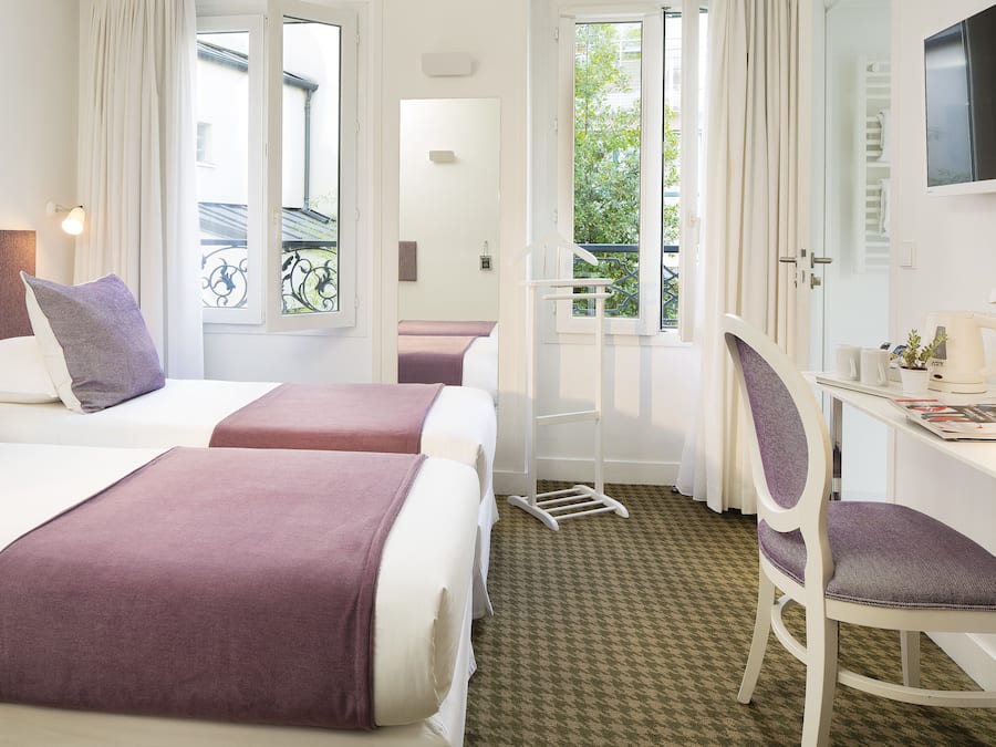 Quarto duplo superior (Twin) | Frigobar, cofres nos quartos, escrivaninha, cortinas blackout