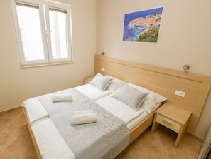 Apartamento, 1 quarto, varanda (2 Adults + 2 Children) | 1 quarto, ferro/tábua de engomar, berços/camas para crianças 