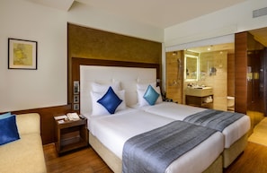 Roupa de alta qualidade, camas de colchão pillowtop, minibar 