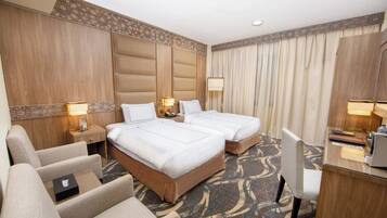 Minibar, cofre no quarto, quartos insonorizados, ferro/tábua de engomar