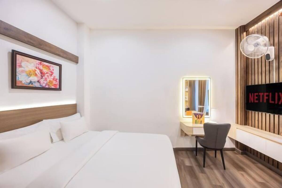 Minibar, cofre no quarto, cortinas/cortinados opacos