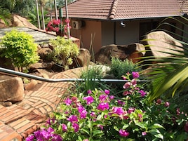 Quarto família, 2 quartos, para não fumantes, vista para a montanha | Vista para o jardim