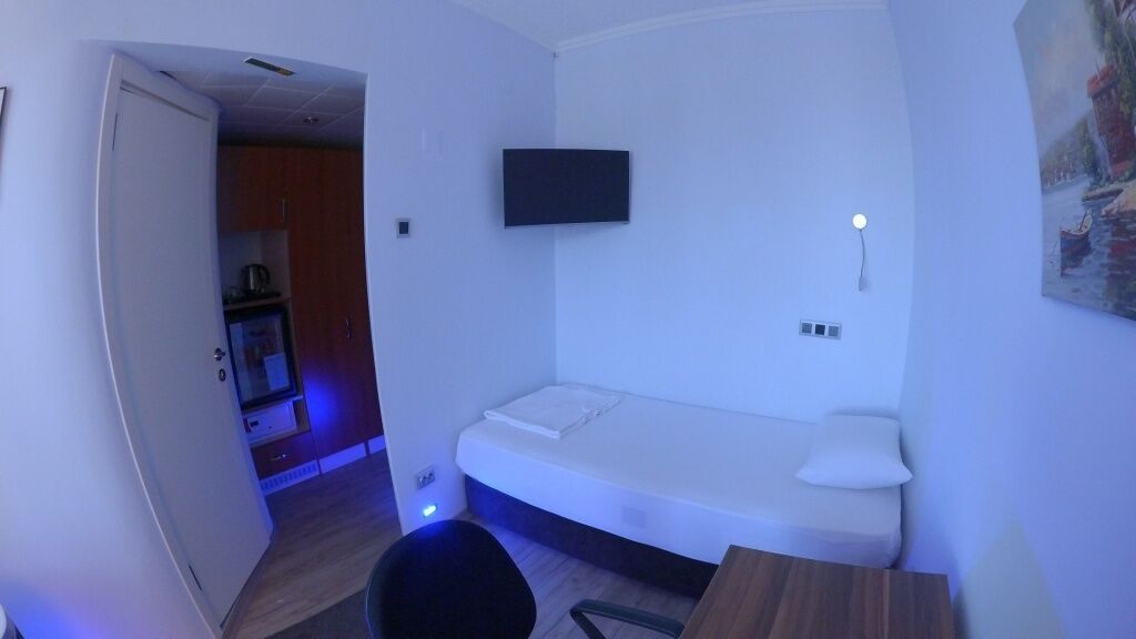 Quarto Twin Empresarial, 2 camas individuais, ar condicionado, vista para o parque | Roupa de alta qualidade, minibar, cofre com capacidade para portátil 