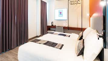 Quarto Twin Deluxe | Cofre no quarto, secretária, Wi-fi grátis, roupa de cama fornecida