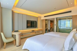 Minibar, cofre no quarto, ferro/tábua de engomar 